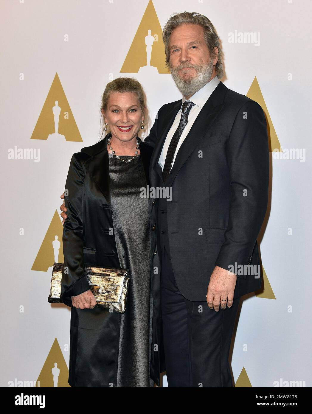 Susan Geston, left, and Jeff Bridges arrives at the 89th Academy Awards ...