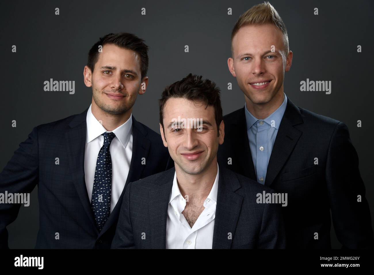 Benj Pasek, from left, Justin Hurwitz and Justin Paul pose for a ...