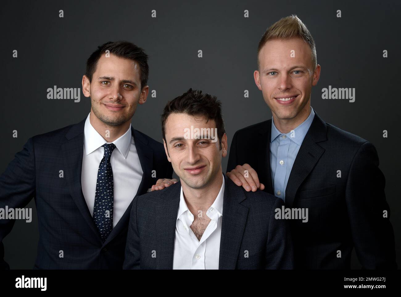 Benj Pasek, from left, Justin Hurwitz and Justin Paul pose for a ...