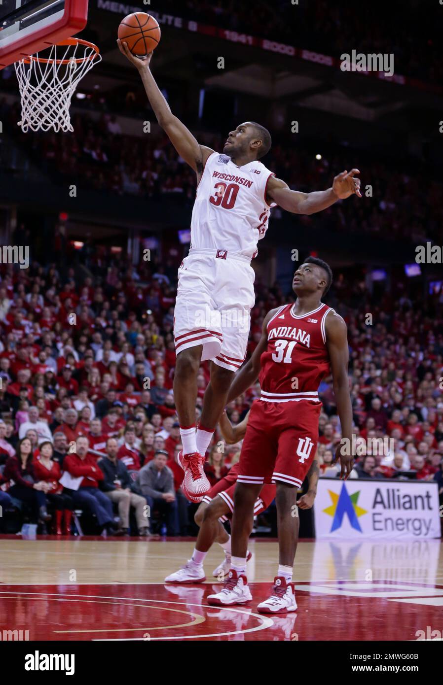 Wisconsin's Vitto Brown (30) shoots past Indiana's Thomas Bryant (31 ...