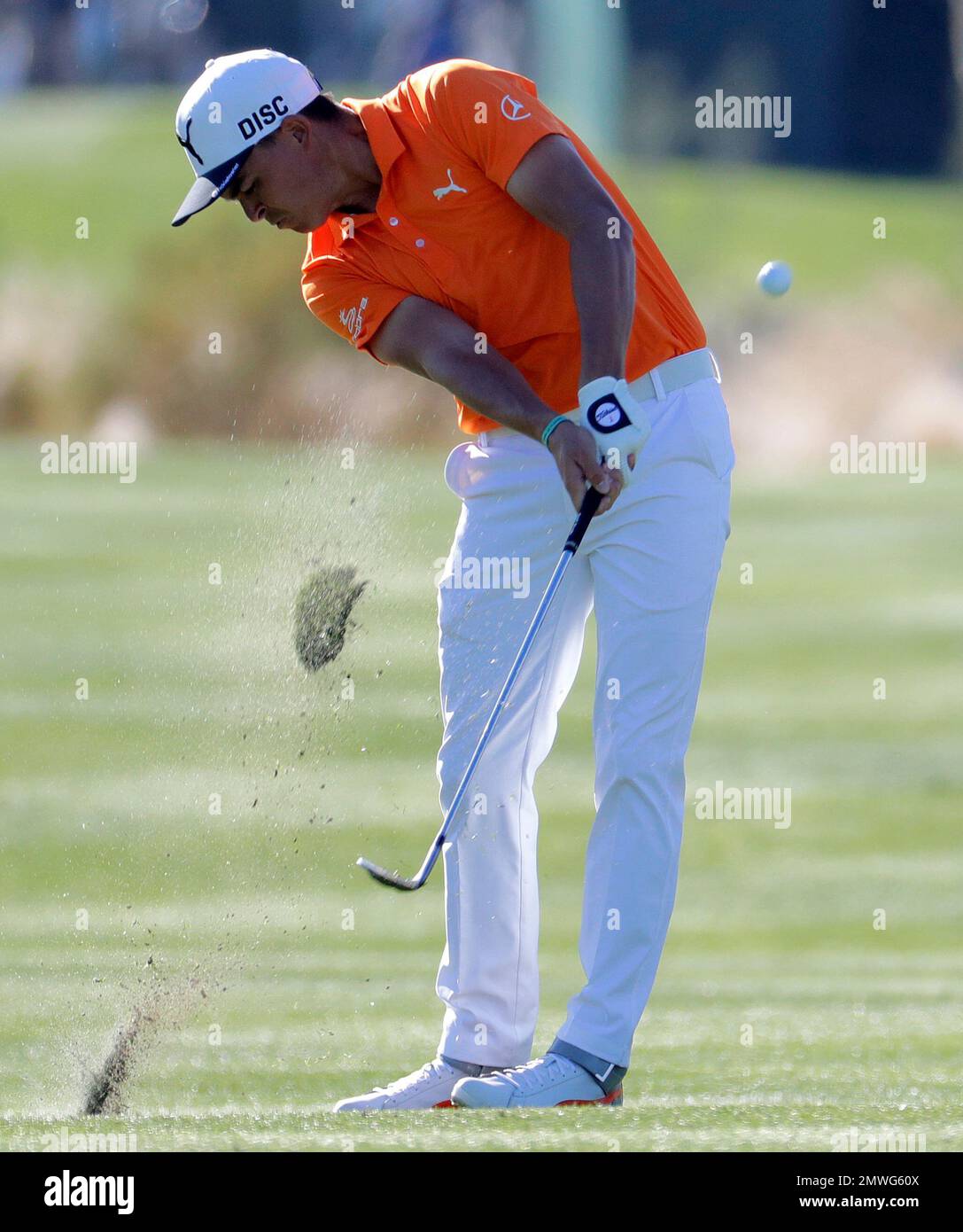 Rickie Fowler hits from the first fairway during the final round of the ...