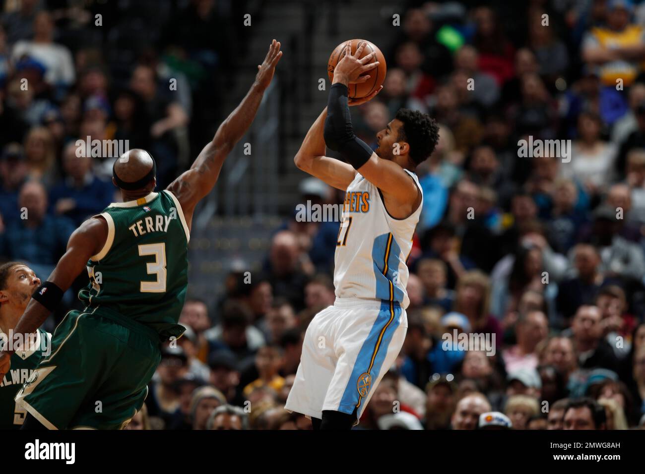Milwaukee Bucks guard Jason Terry (3) and Denver Nuggets guard Jamal ...