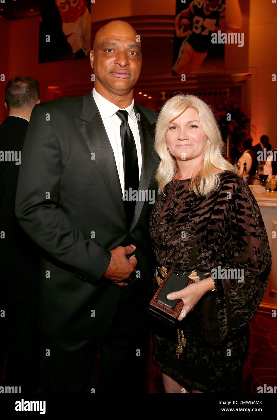 Former NFL player Darryl Talley, left, and Janine Talley attend the 6th ...