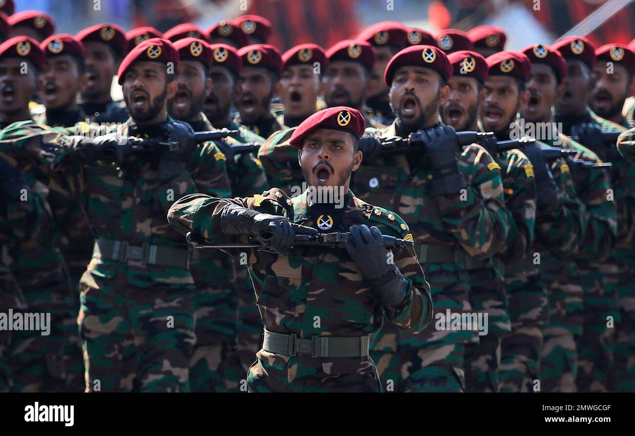 Sri Lankan army soldiers march during the Independence Day parade ...