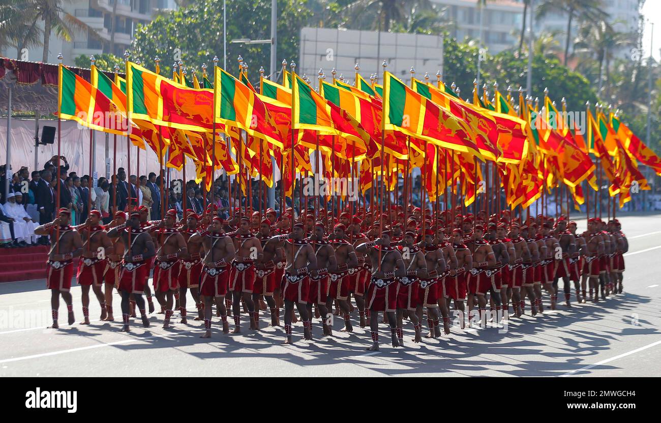 Sri Lankan army soldiers, dressed in traditional costume, march ...
