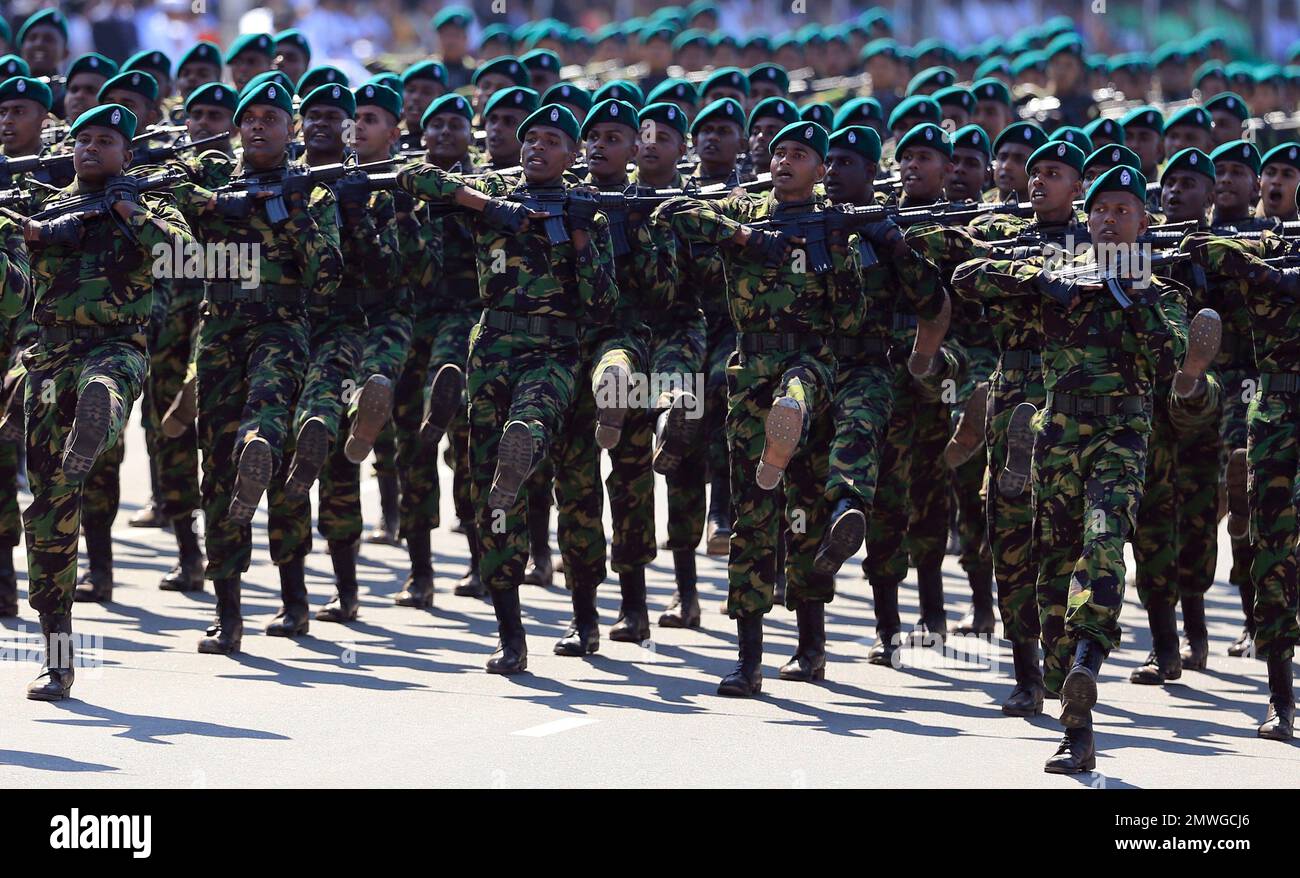 Sri Lankan army soldiers march during Independence Day parade, marking ...