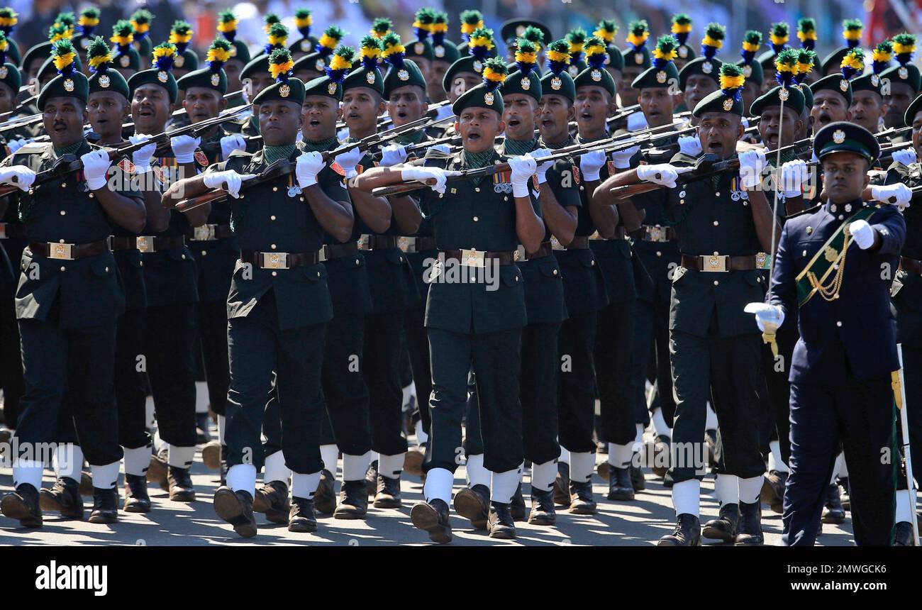 Sri Lankan army soldiers march during Independence Day parade, marking ...