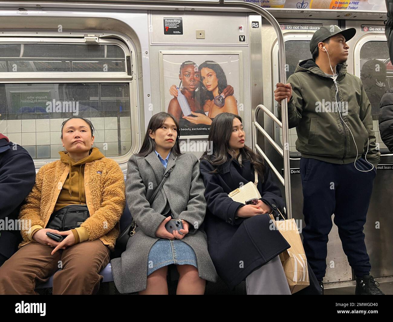Riders on a New York City subway train in Manhattan, New York City ...