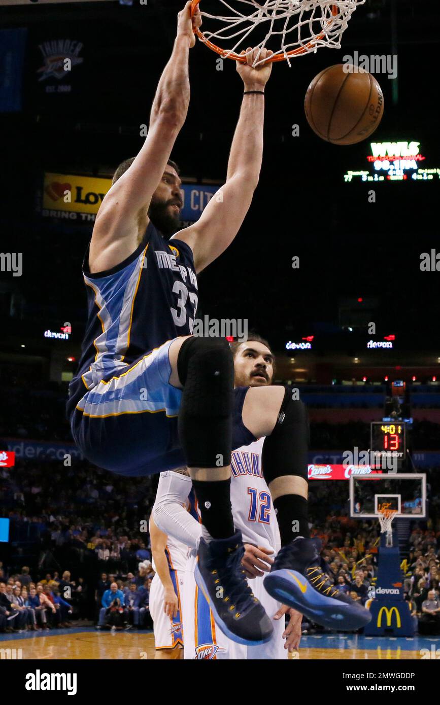 Memphis Grizzlies center Marc Gasol (33) dunks in front of Oklahoma ...