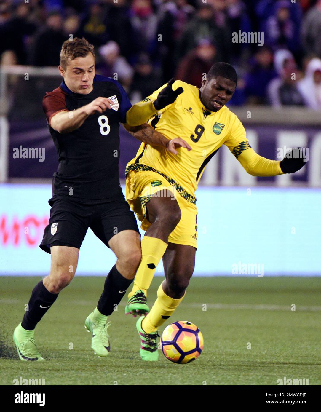 United States' Jordan Morris (8) is defended by Jamaica's Ewan Grandson ...