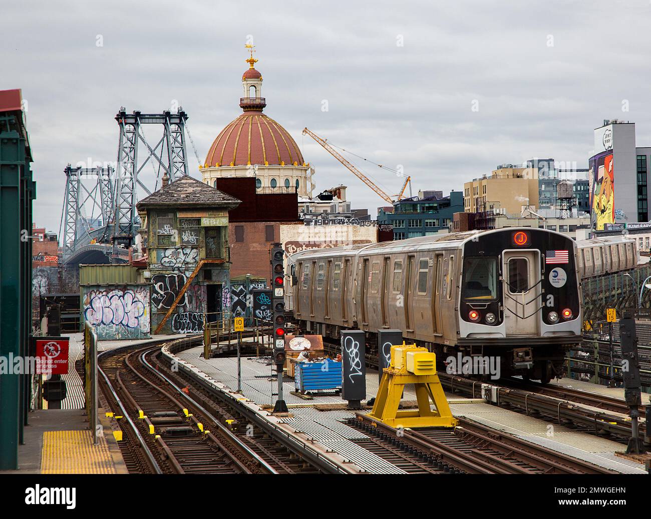 Subway train pulls into the Marcy Street elevated subway station in the Williamsburg ...