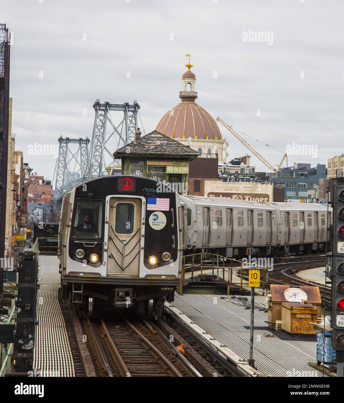 Subway train pulls into the Marcy Street elevated subway station in the Williamsburg ...