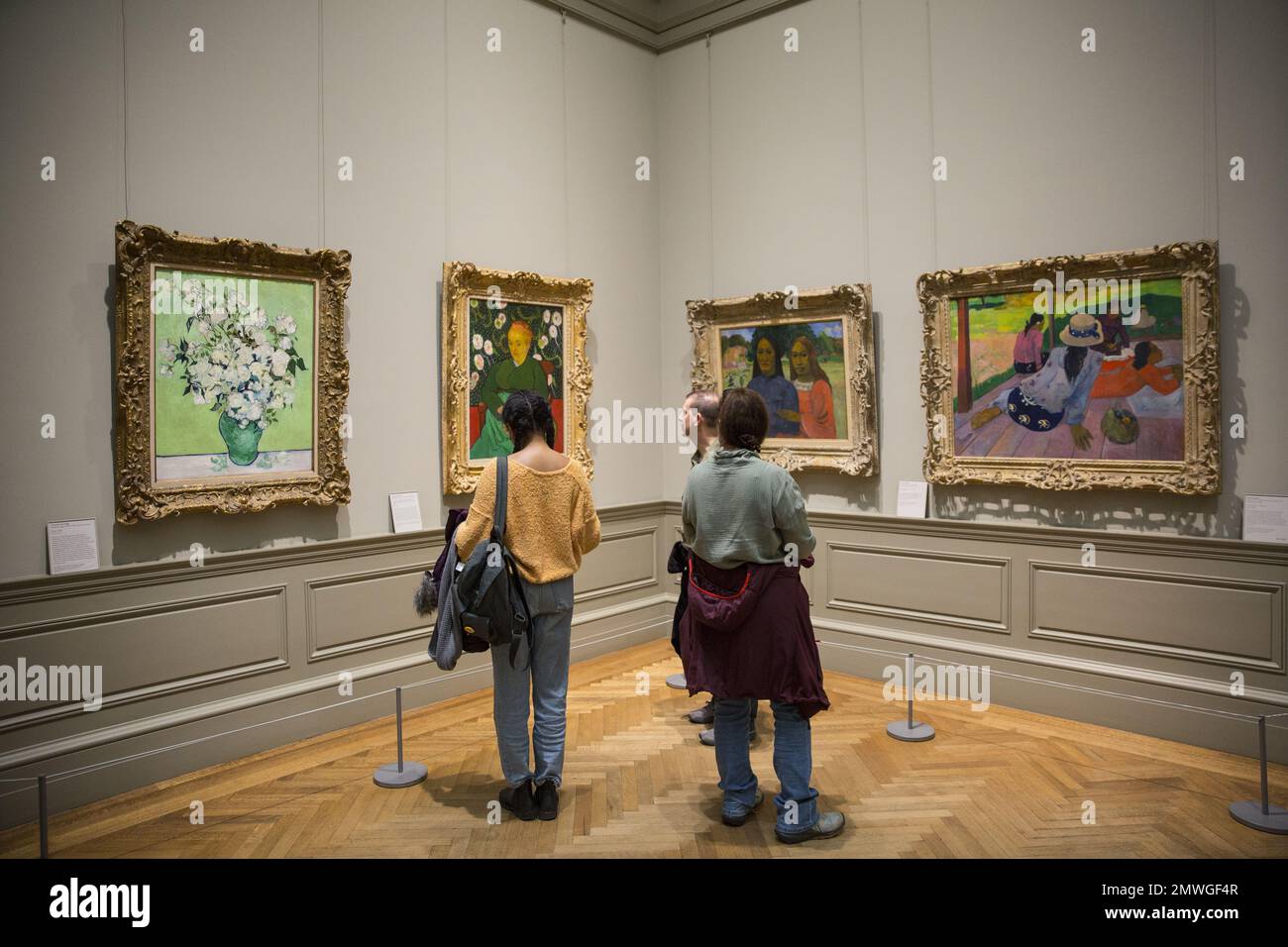 Visitors in the European Art galleries at the MET view paintings by ...