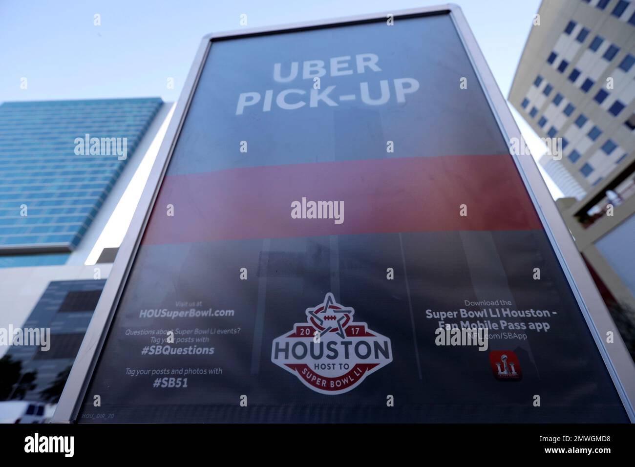In this Tuesday, Jan. 30, 2017 photo, a sign marks an Uber designated ...
