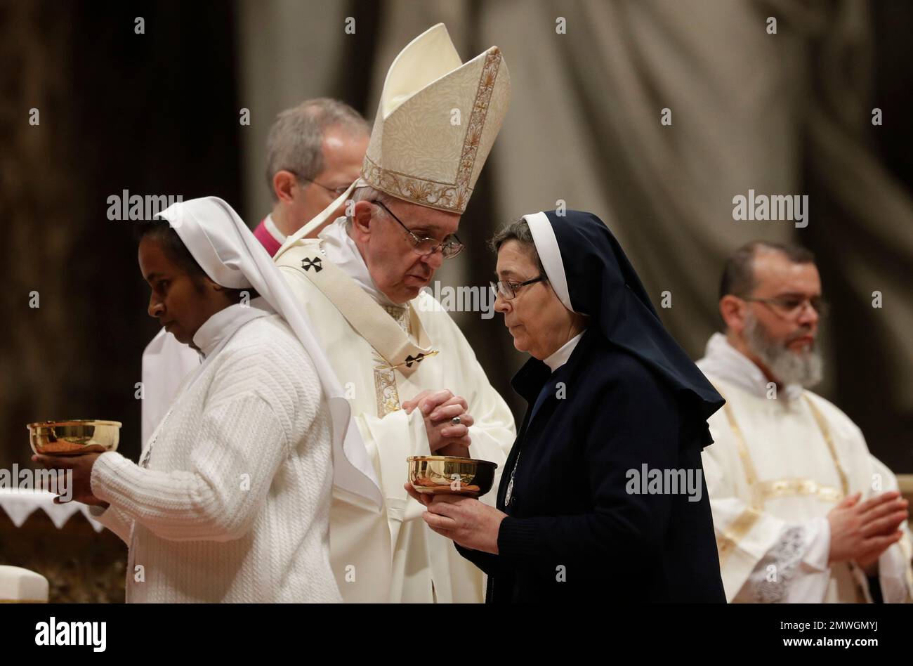 Pope Francis celebrates a mass for nuns and priests in St. Peter's ...