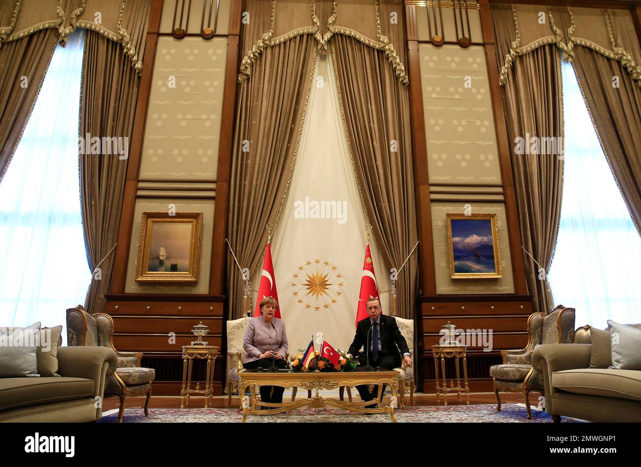 German Chancellor Angela Merkel, left, and Turkish President Recep ...