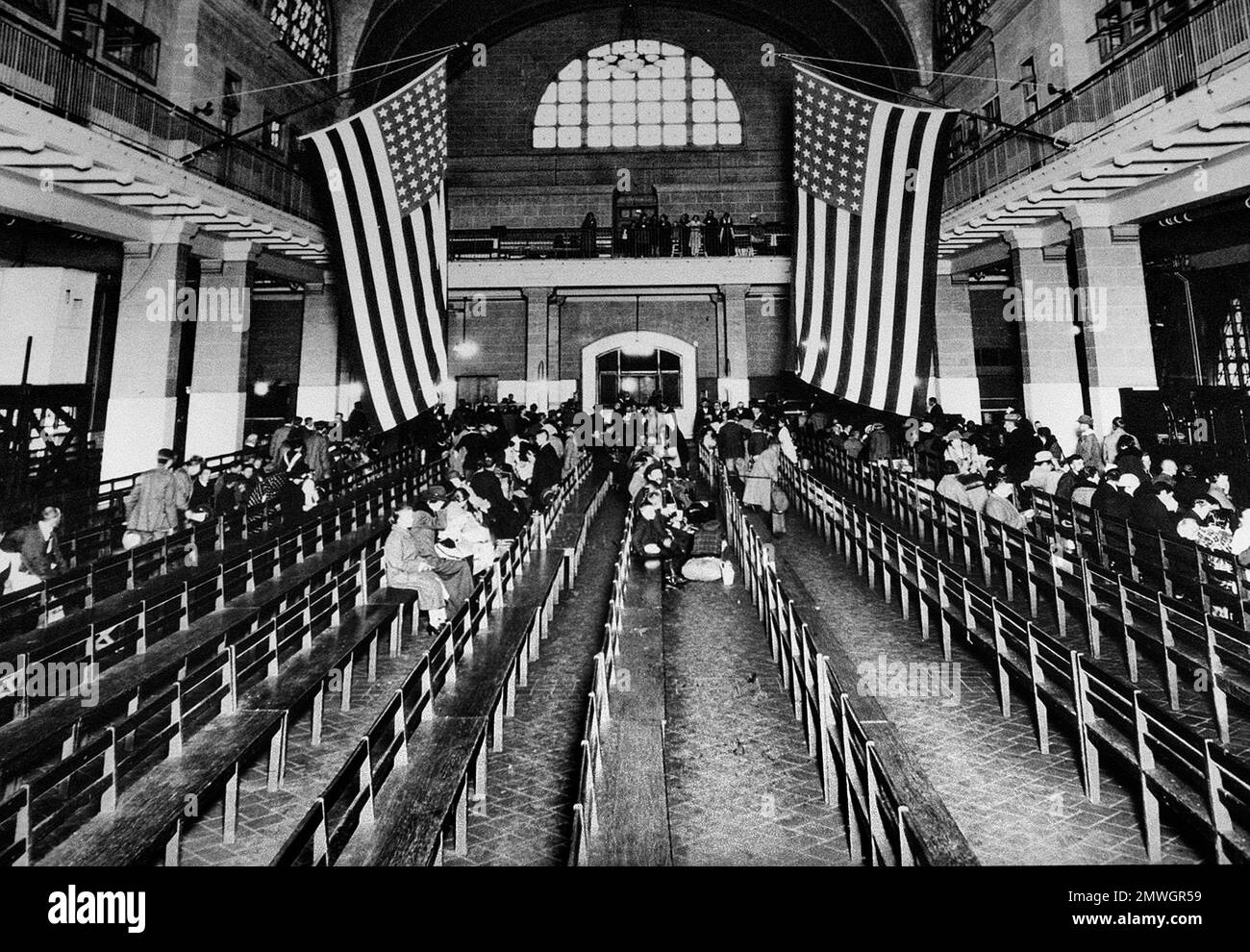 FILE - This 1924 file photo shows the registry room at Ellis Island in ...