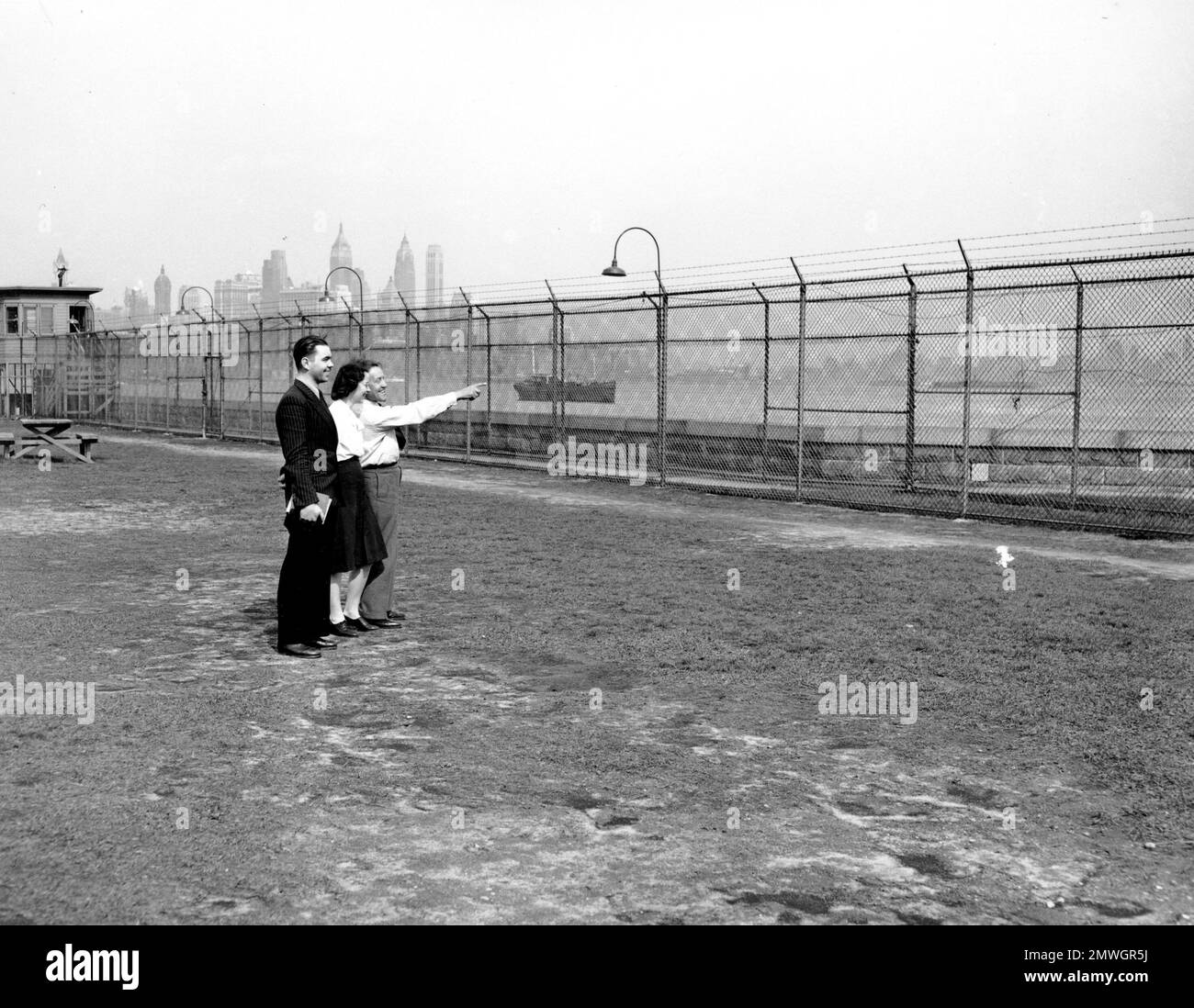 FILE - In this April 7, 1949 file photo, immigrants look at the view ...