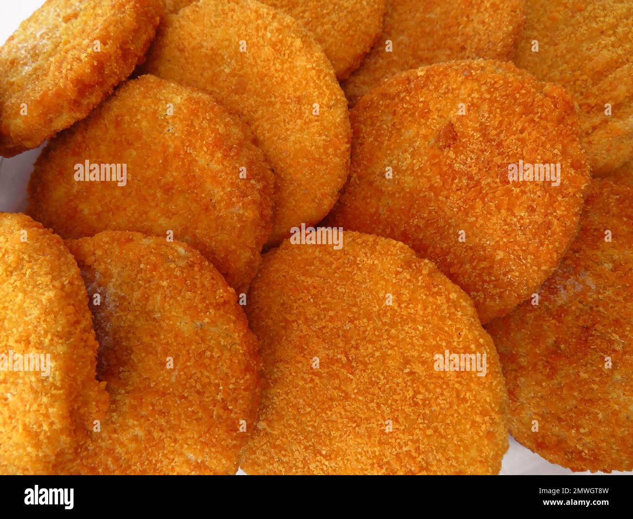Clouseup background of fresh crispy fried fish cutlets Stock Photo - Alamy