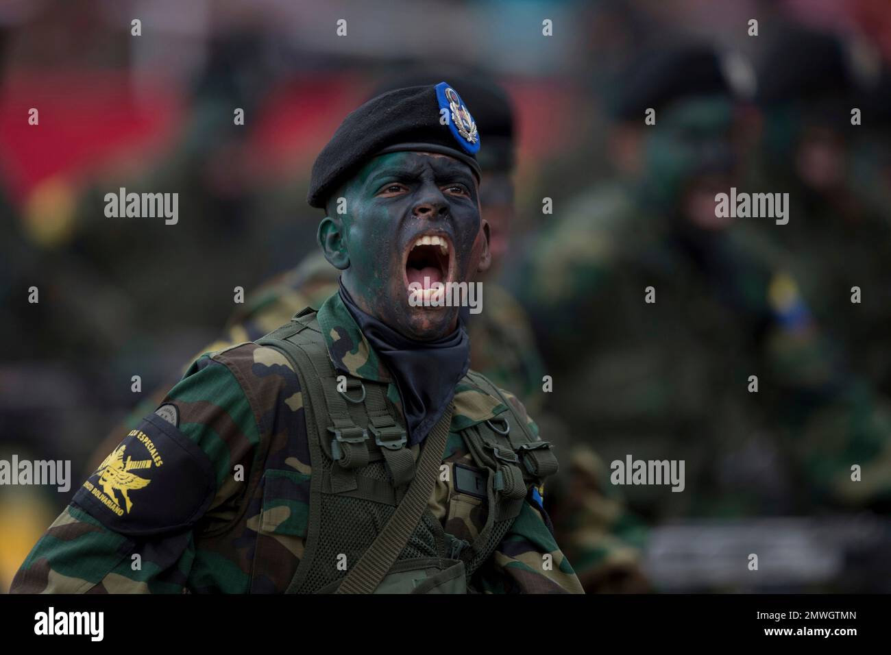 An army special forces soldier shouts during a military parade at Fort ...
