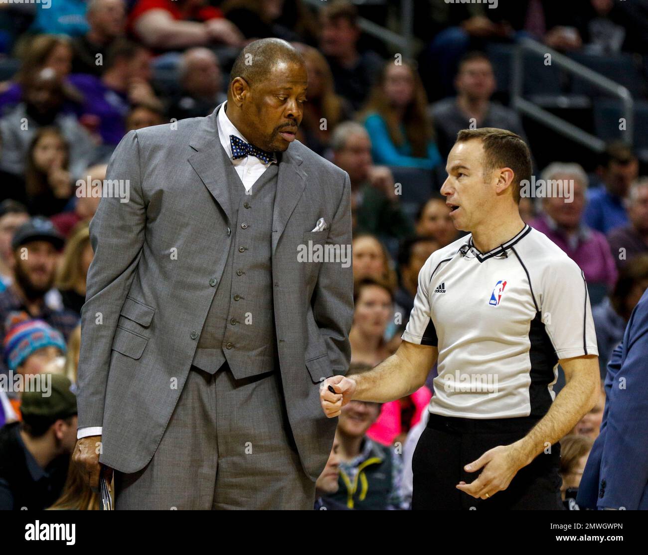 Charlotte Hornets assistant coach Patrick Ewing, left, talks to NBA ...