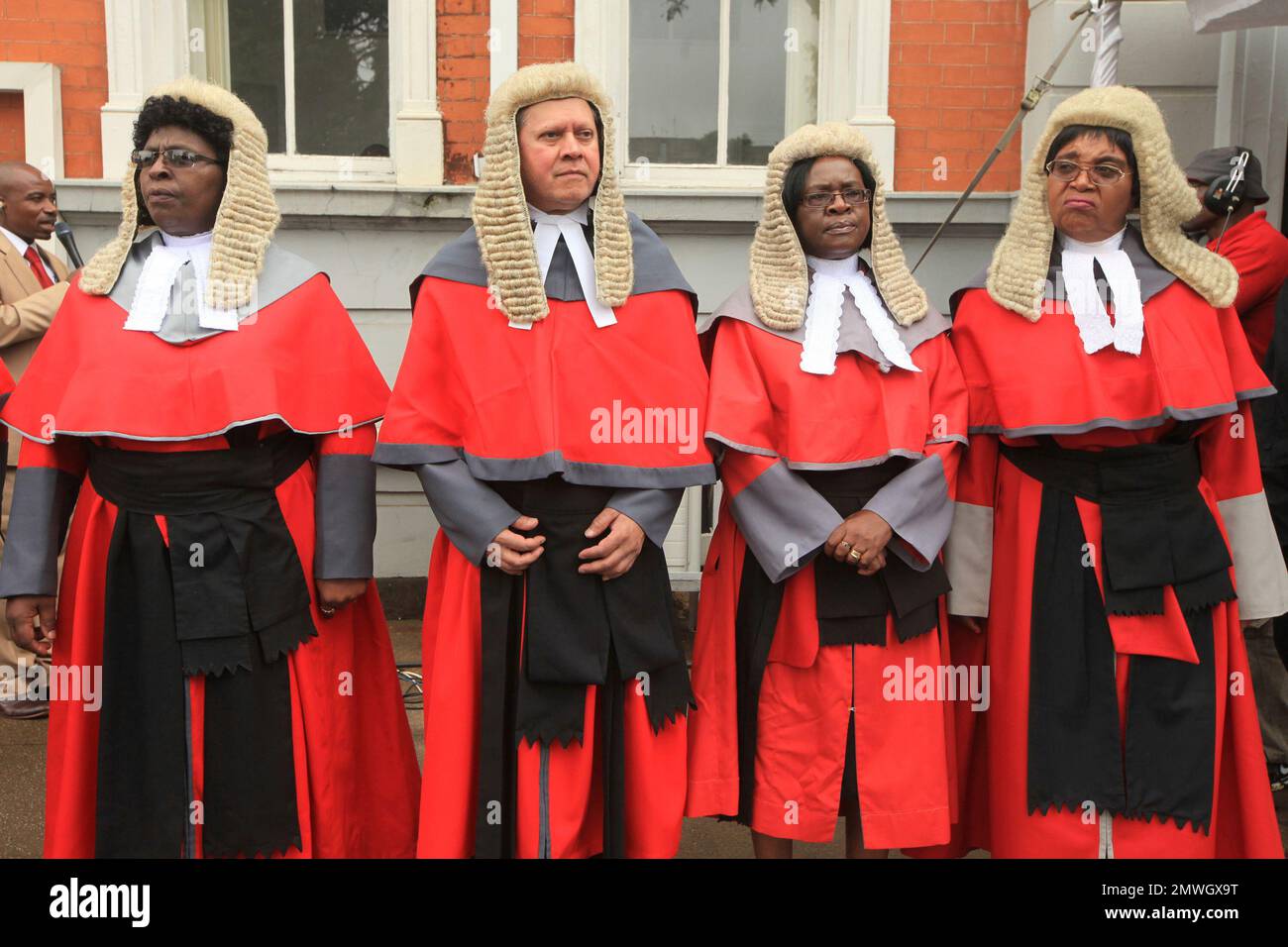 Zimbabwean judges in long red robes and horsehair wigs, a throwback to ...