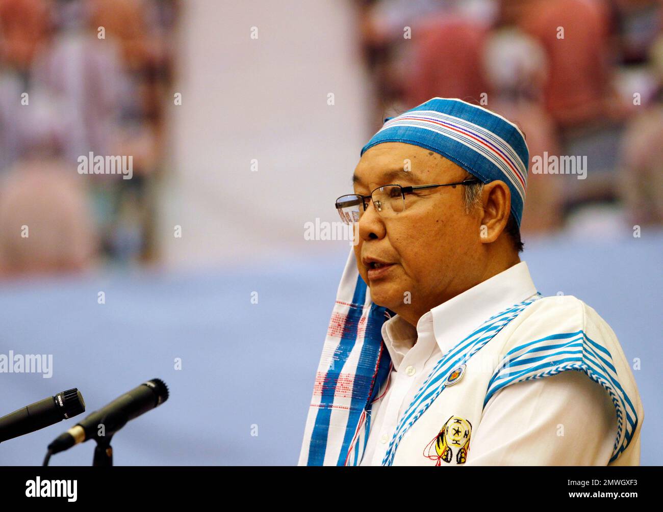 Parliament Chairman Mahn Win Khaing Than delivers a speech during a ...