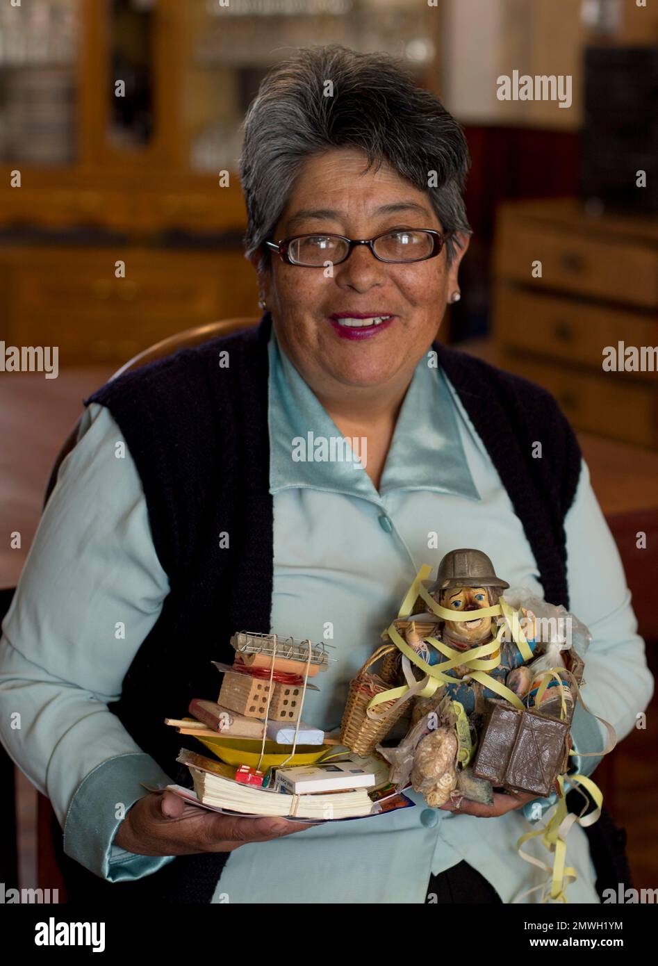 In this Jan. 28, 2017 photo, Ana Rosario Azuga poses inside her home ...