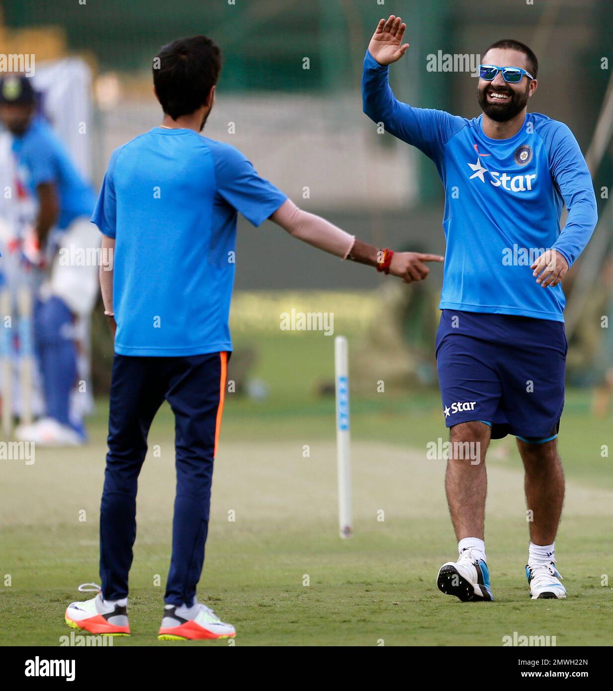 India's Parvez Rasool, right, attends a training session with teammate ...