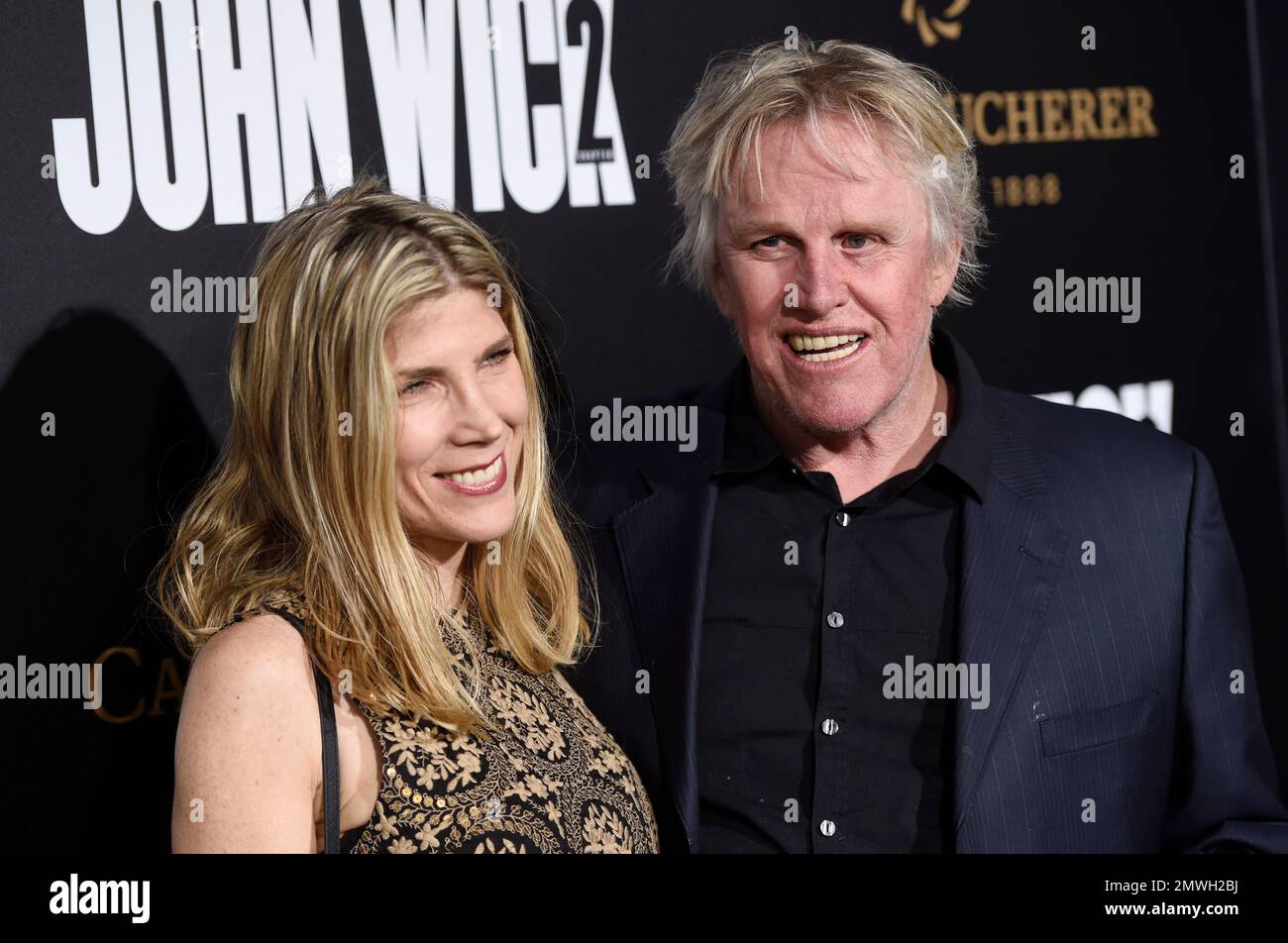Actor Gary Busey and Steffanie Sampson pose together at the premiere of ...