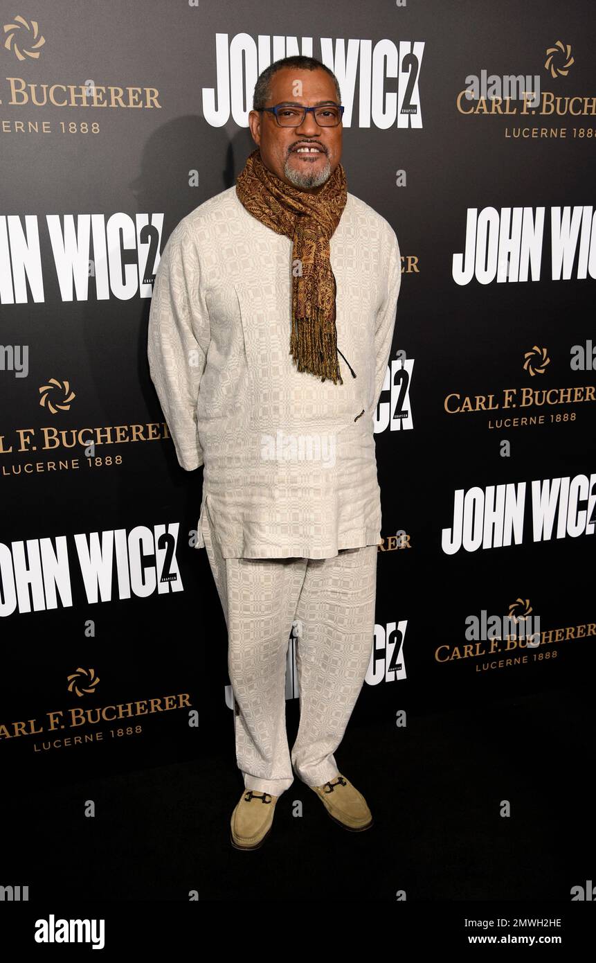 Laurence Fishburne, a cast member in "John Wick: Chapter 2," poses at ...