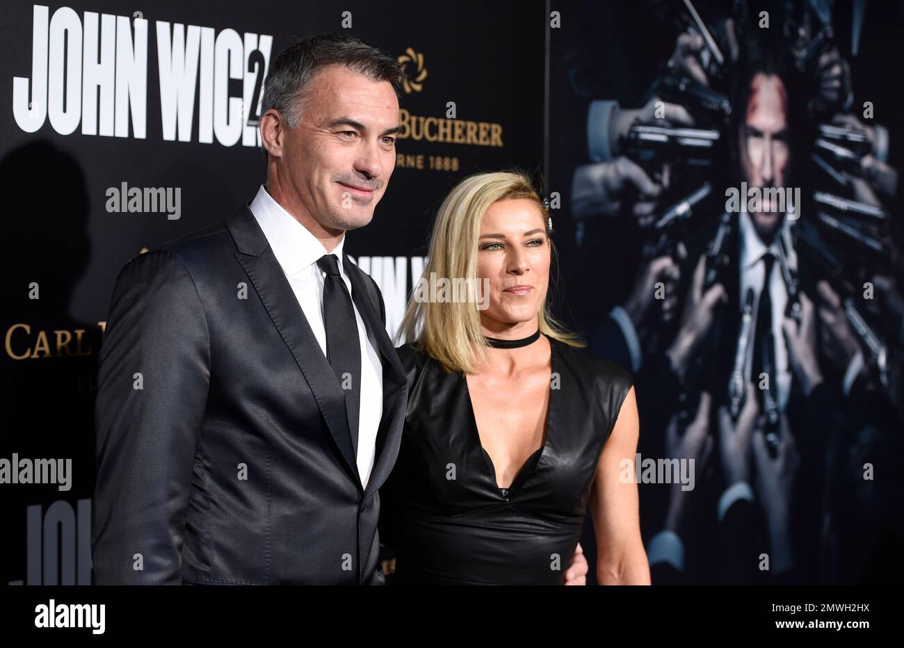 Chad Stahelski, director of "John Wick: Chapter 2," poses with Heidi ...