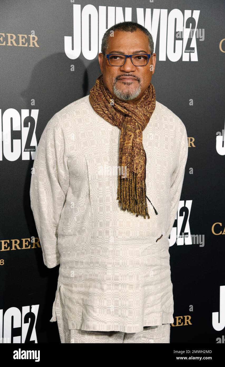 Laurence Fishburne, a cast member in "John Wick: Chapter 2," poses at ...