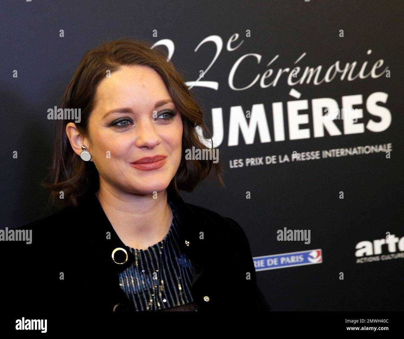 French actress Marion Cotillard poses during a photocall prior to the ...
