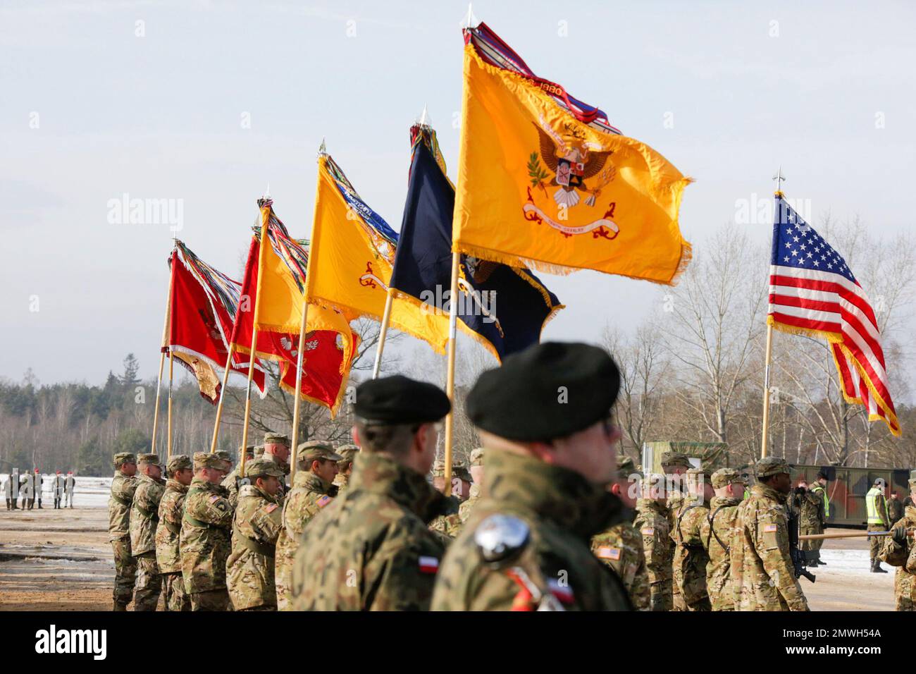 U.S. Army and Polish Army soldiers attend a ceremony opening their ...