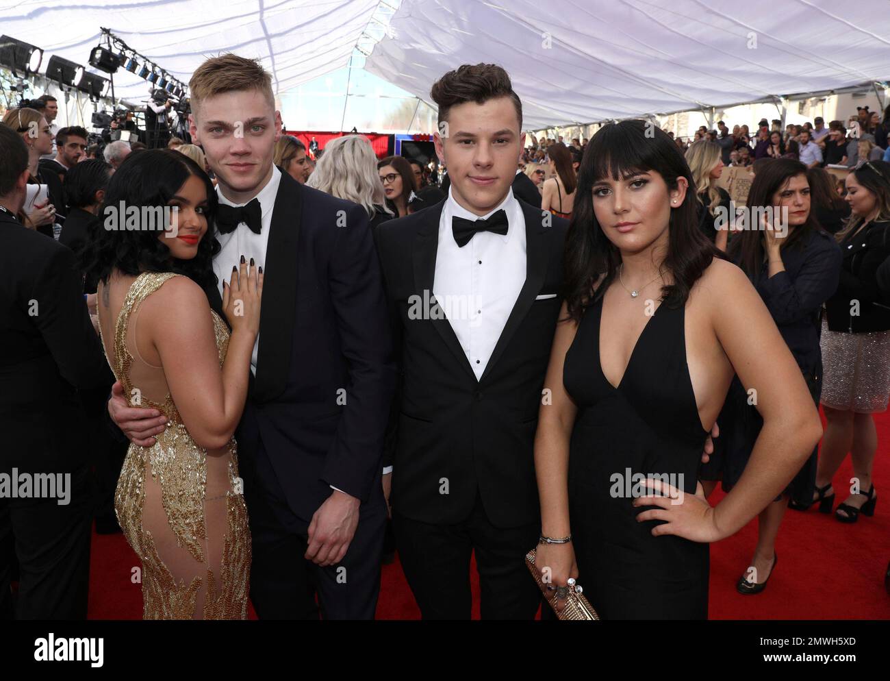 Ariel Winter, from left, Levi Meaden, Nolan Gould and guest arrive at ...