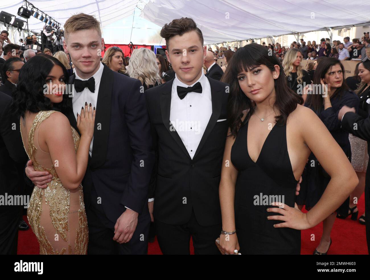 Ariel Winter, from left, Levi Meaden, Nolan Gould and guest arrive at ...