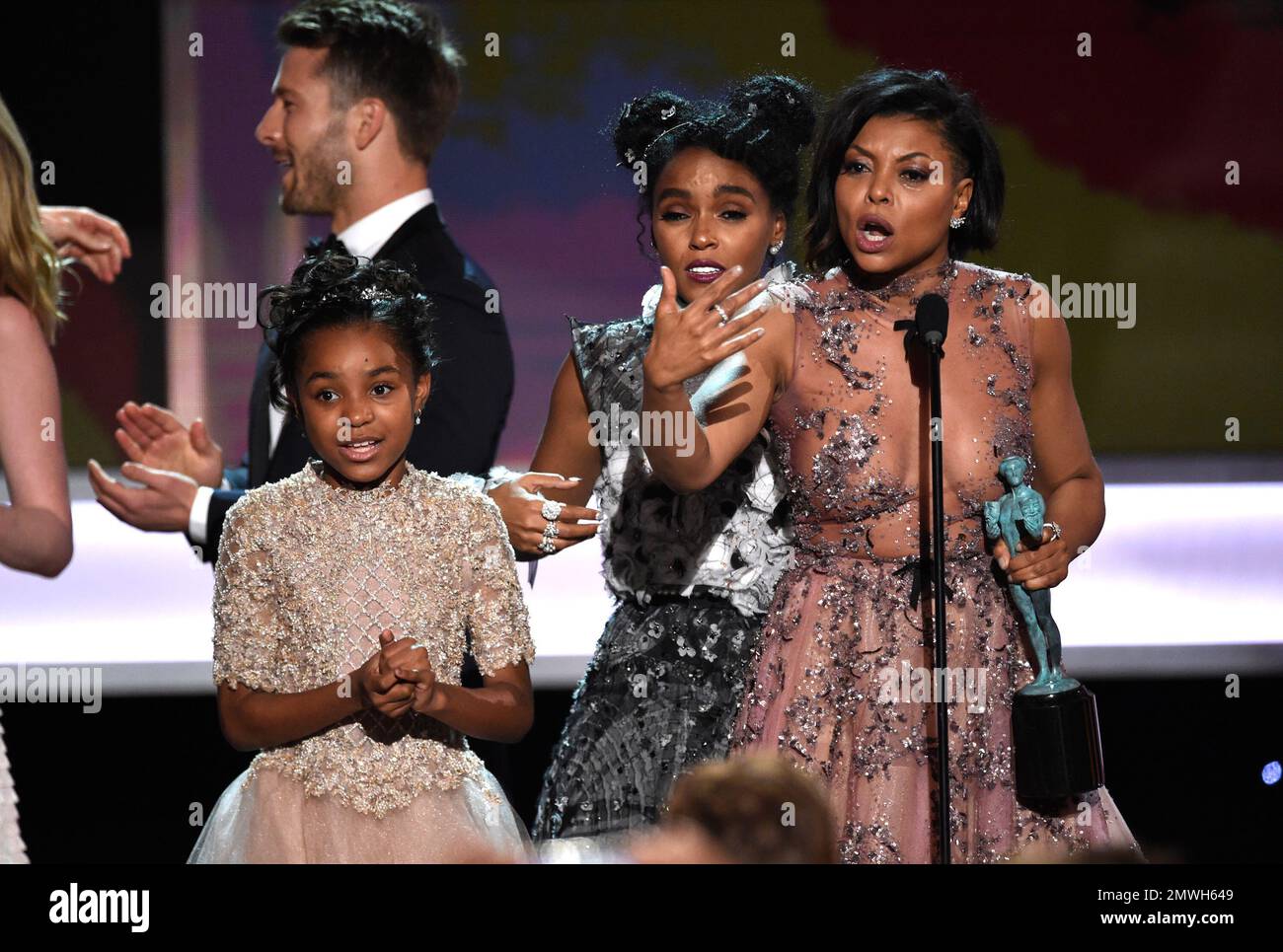 Taraji P. Henson, from right, Janelle Monae, and Saniyya Sidney accept ...