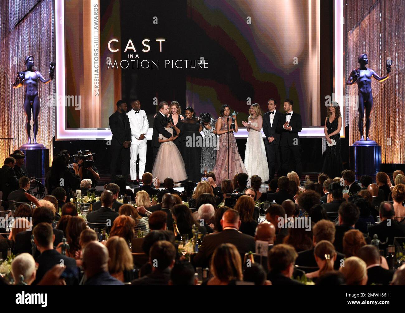 The cast of "Hidden Figures" accept the award for outstanding ...