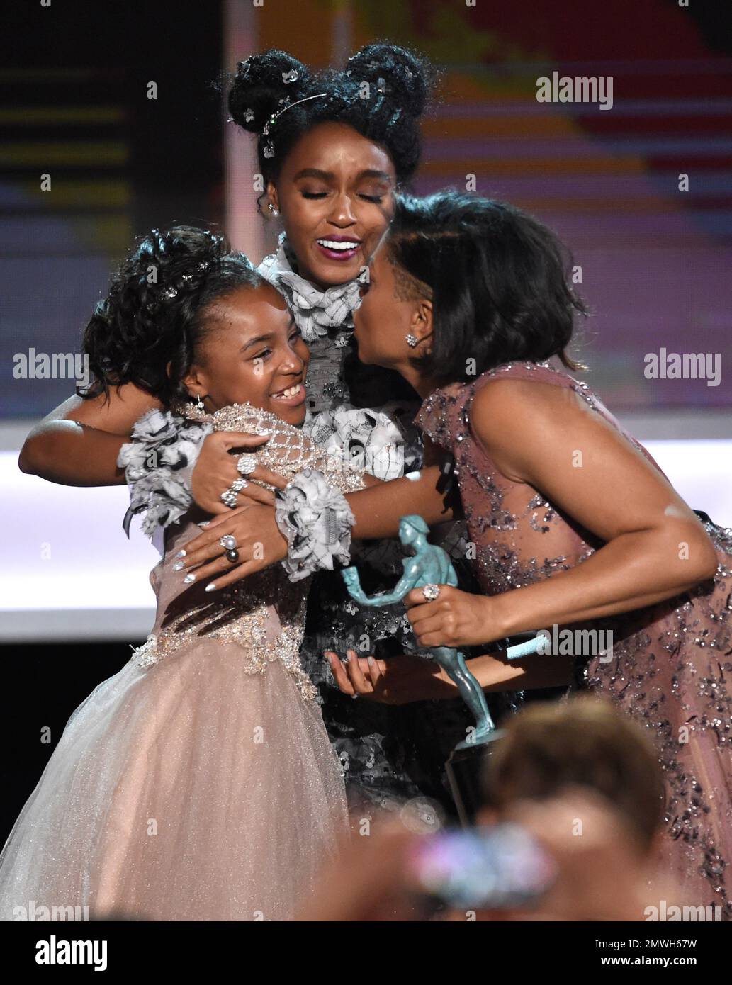 Taraji P. Henson, from right, Janelle Monae, and Saniyya Sidney hug on ...