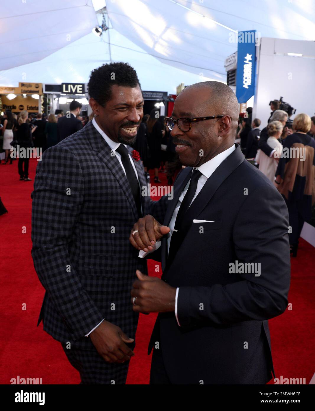 Deon Cole, left, and Courtney B. Vance arrive at the 23rd annual Screen ...