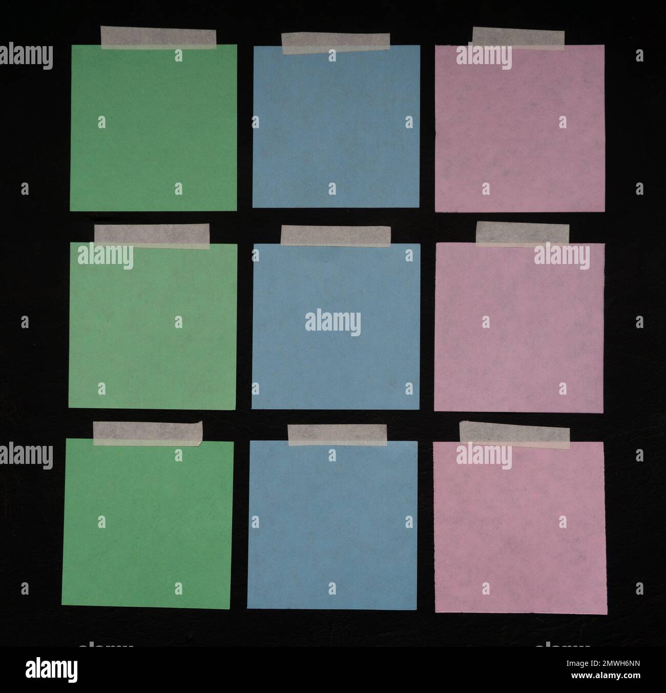 A view of squares in different colors isolated in black background ...