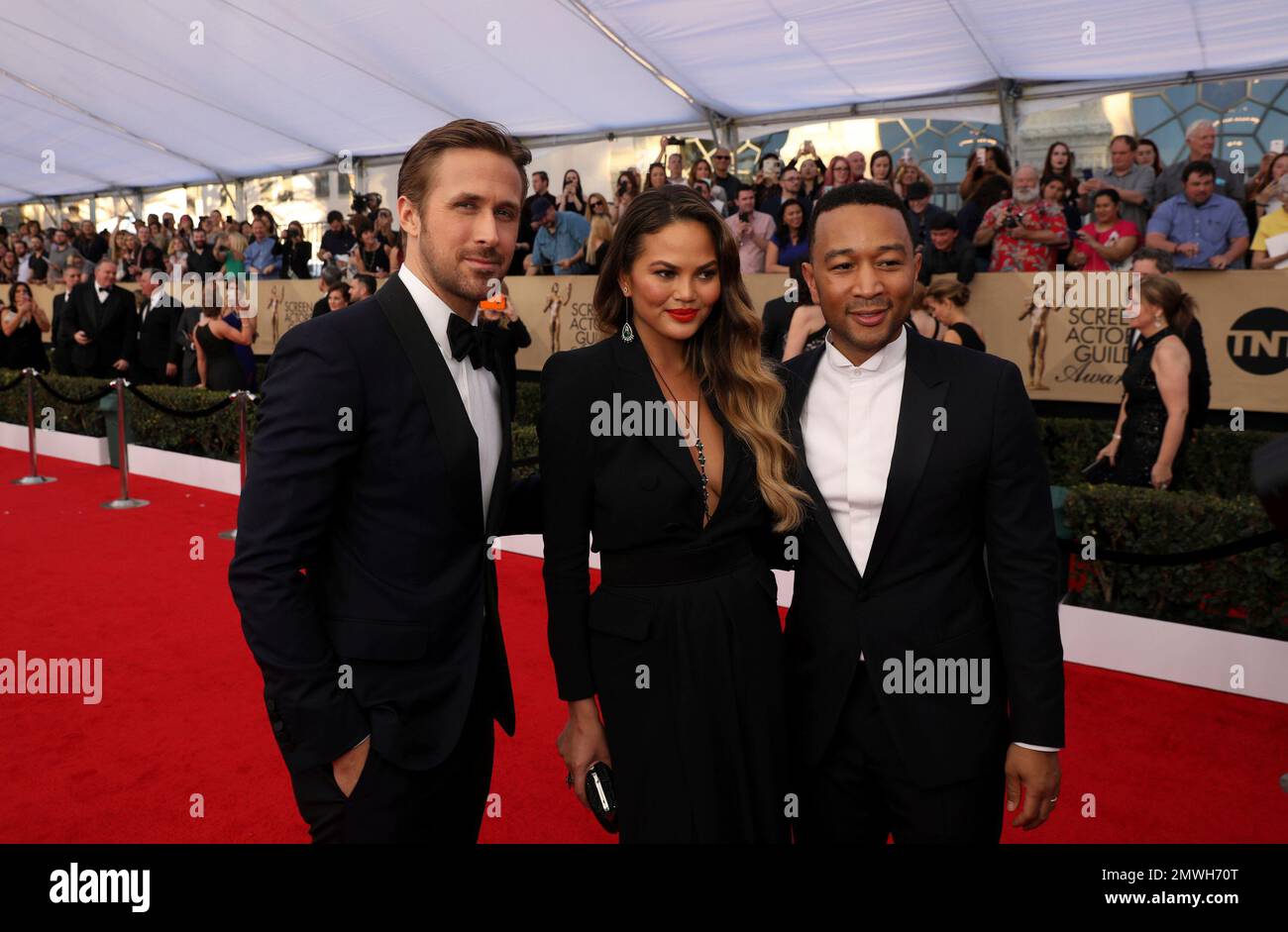 Ryan Gosling, from left, Chrissy Teigen and John Legend arrive at the ...