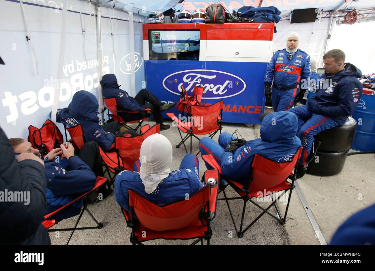 Chip Ganassi Racing team crew members watch the IMSA 24-hour auto race ...