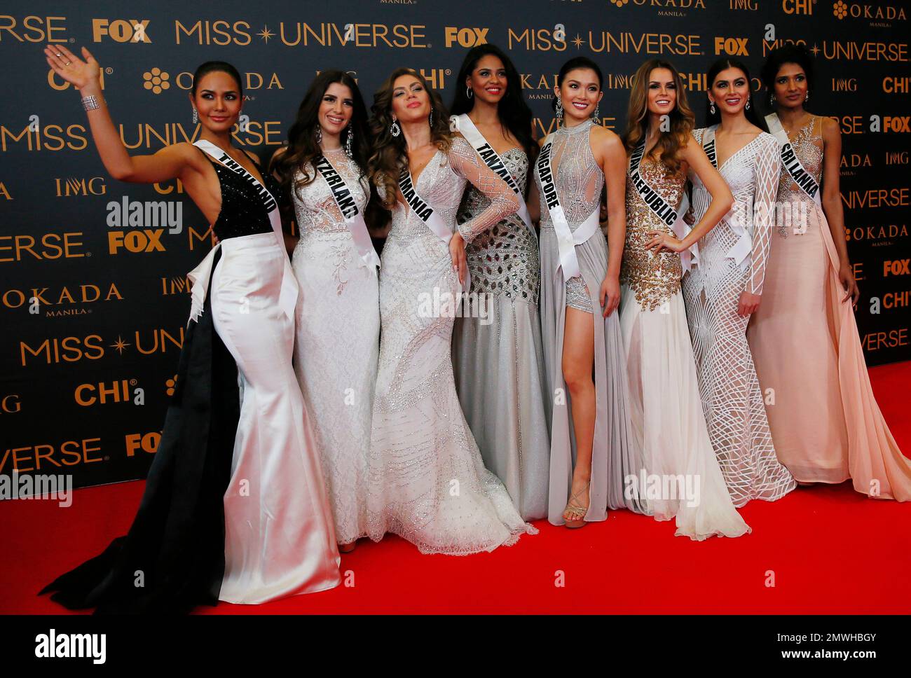 Miss Universe contestants pose on the red carpet on the eve of their ...