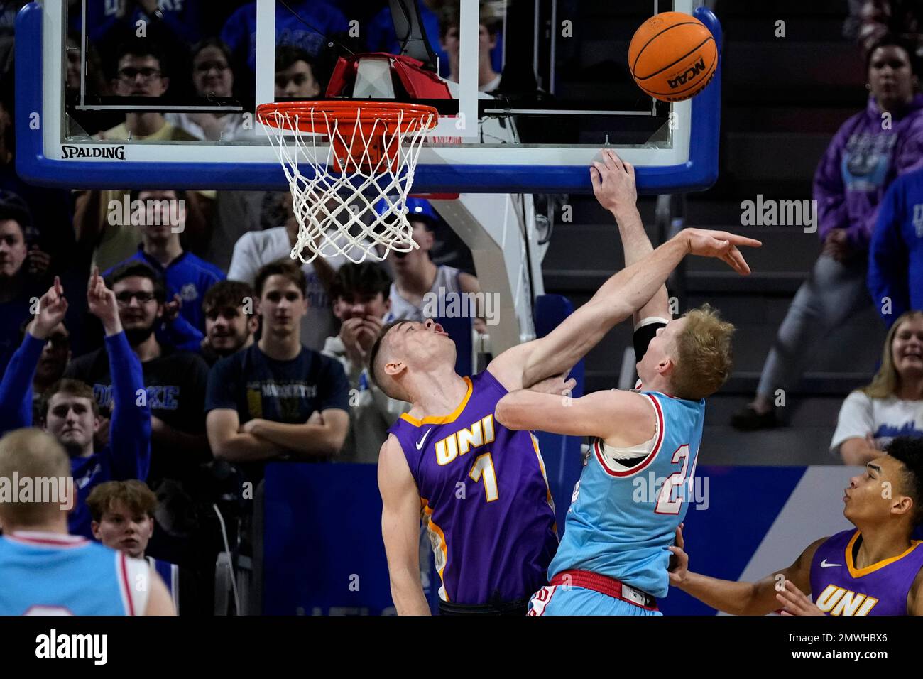 Northern Iowa forward Cole Henry (1) blocks a shot by Drake forward ...