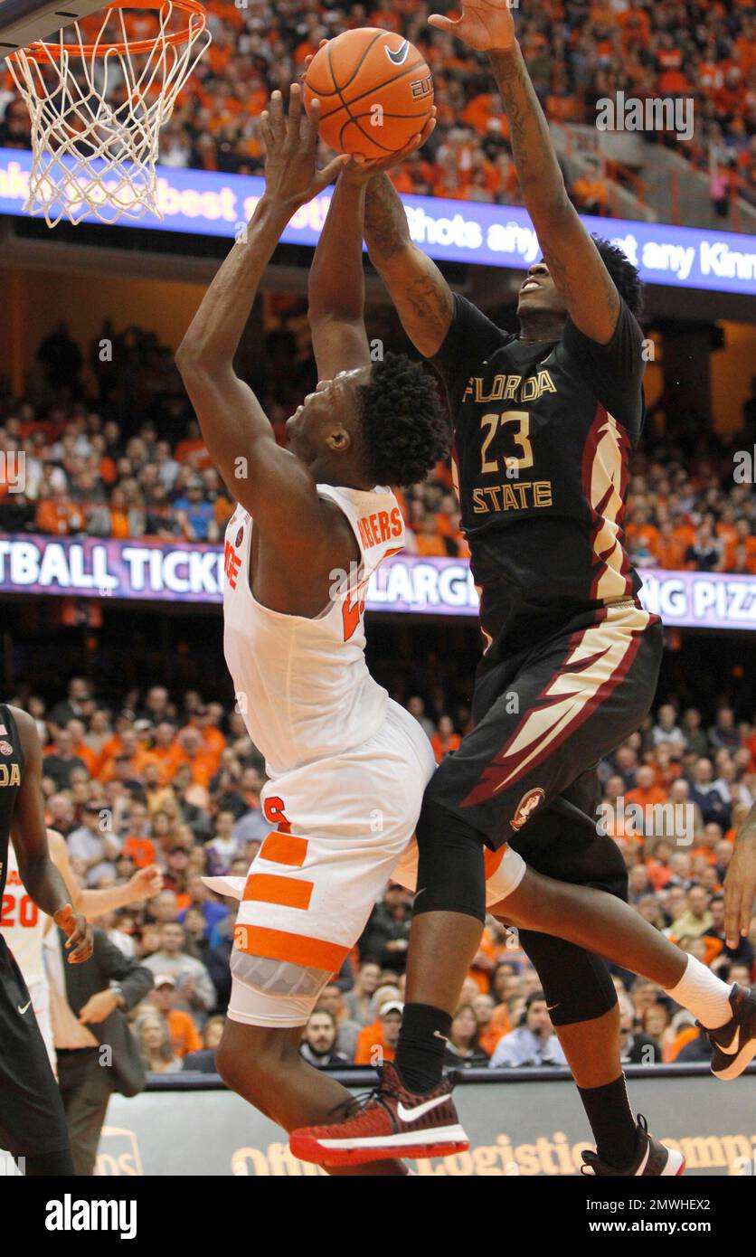 Florida State's Jarquez Smith, right, fouls Syracuse's Tyler Roberson ...