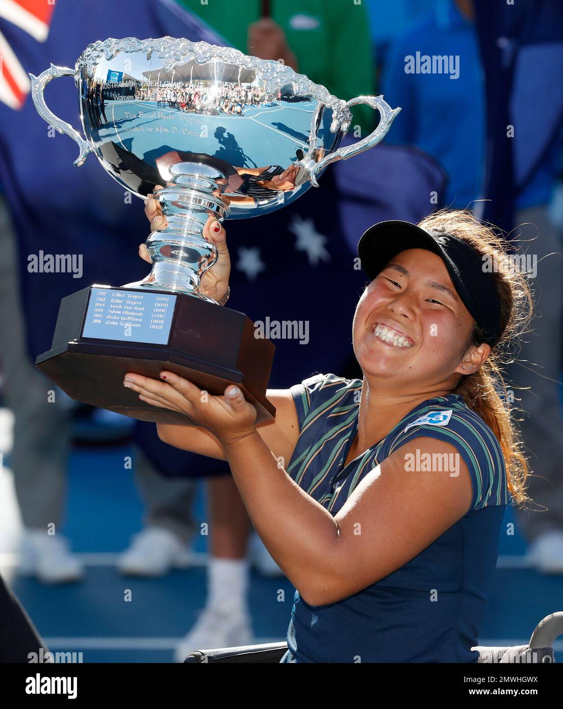 Japan's Yui Kamiji holds her trophy aloft after winning the women's ...