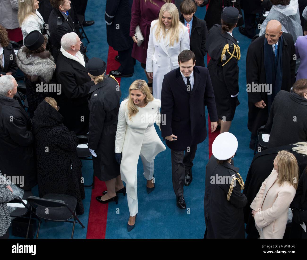 Ivanka Trump and her husband Jared Kushner, followed by Tiffany Trump ...