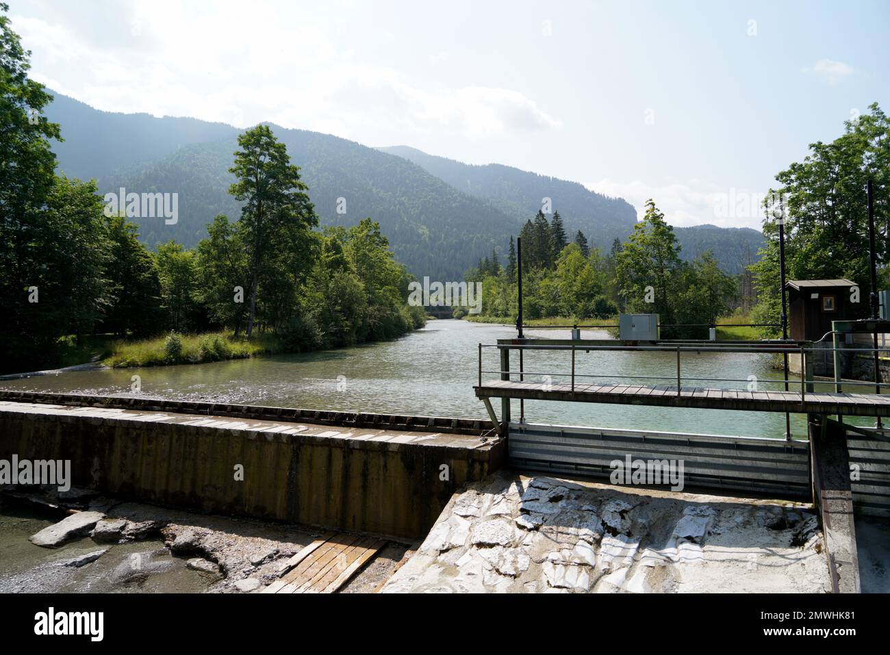 A beautiful landscape of a reservoir on the background of the green ...